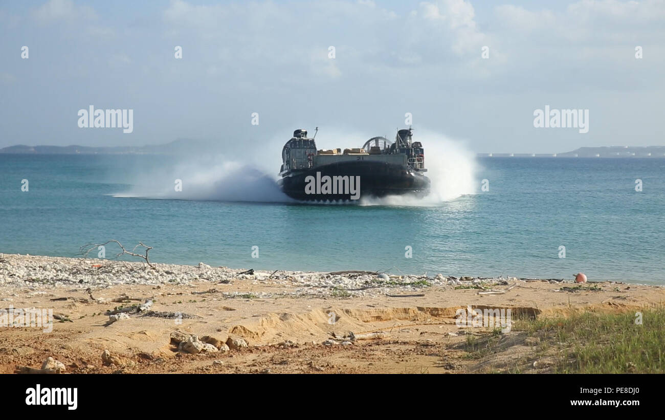 A landing craft air cushion-class hovercraft approaches Kin Blue ...