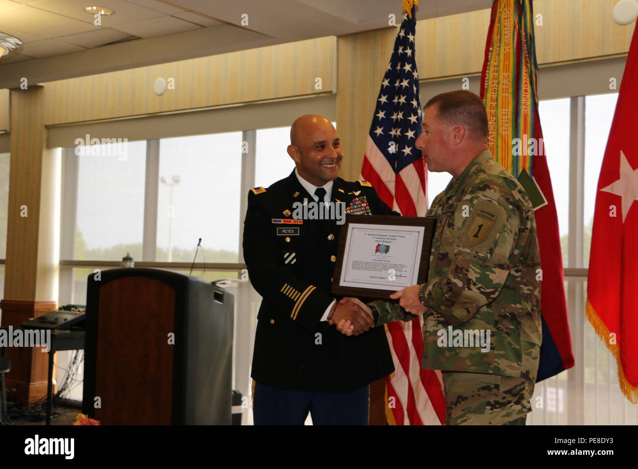 Chief Warrant Officer 2 Edwin Reyes, left, airspace manager with 1st ...