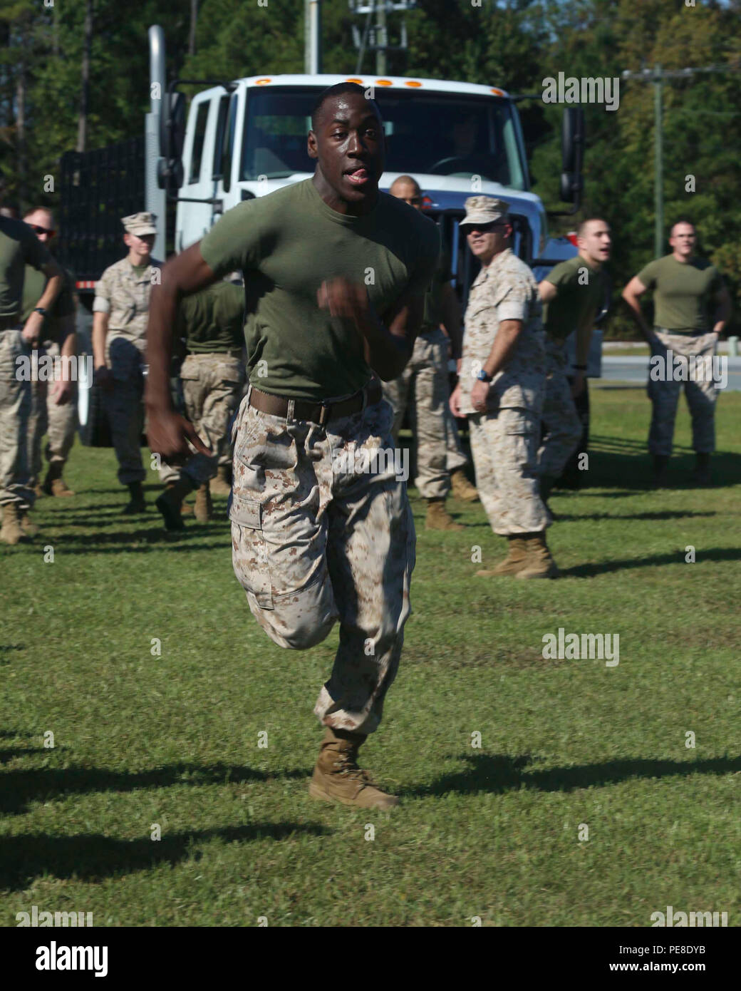 A U.S. Marine competes in an all ranks relay race at Marine Corps Air ...