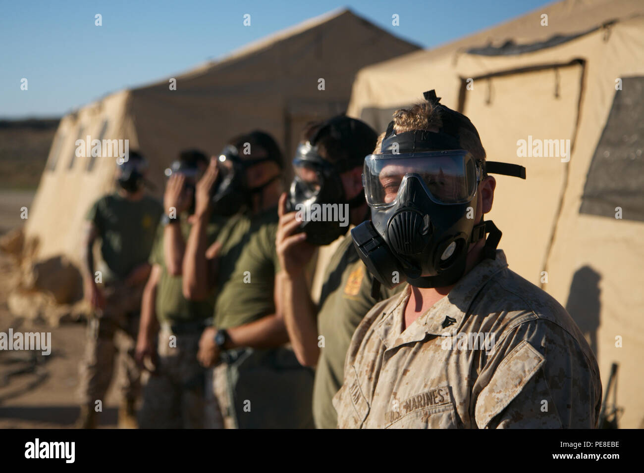 Marines with 11th Marine Expeditionary Unit don gas mask for chemical ...