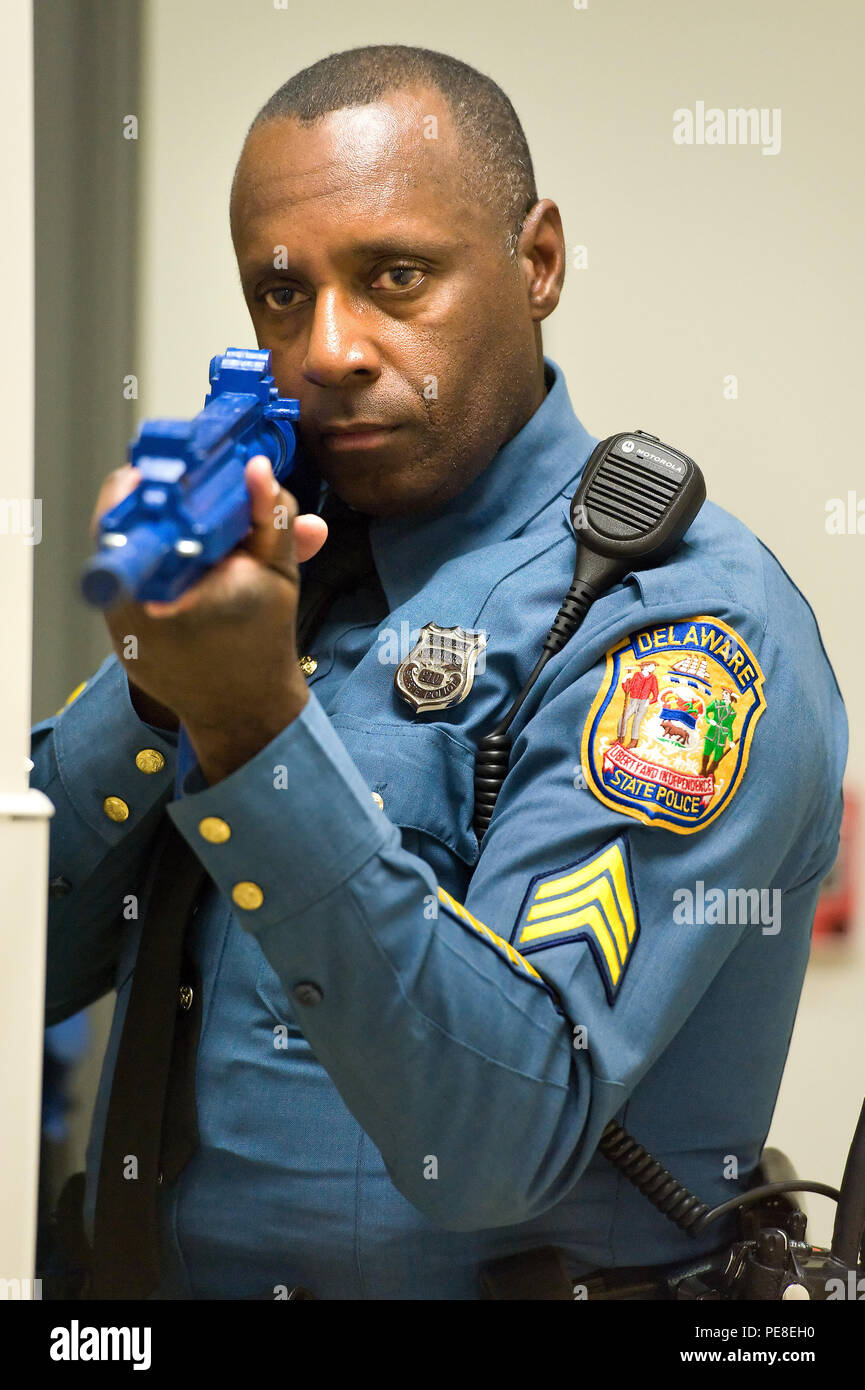 Sgt. Bruce Harris, Delaware State Police, Troop 3, Camden, Del., stands ...