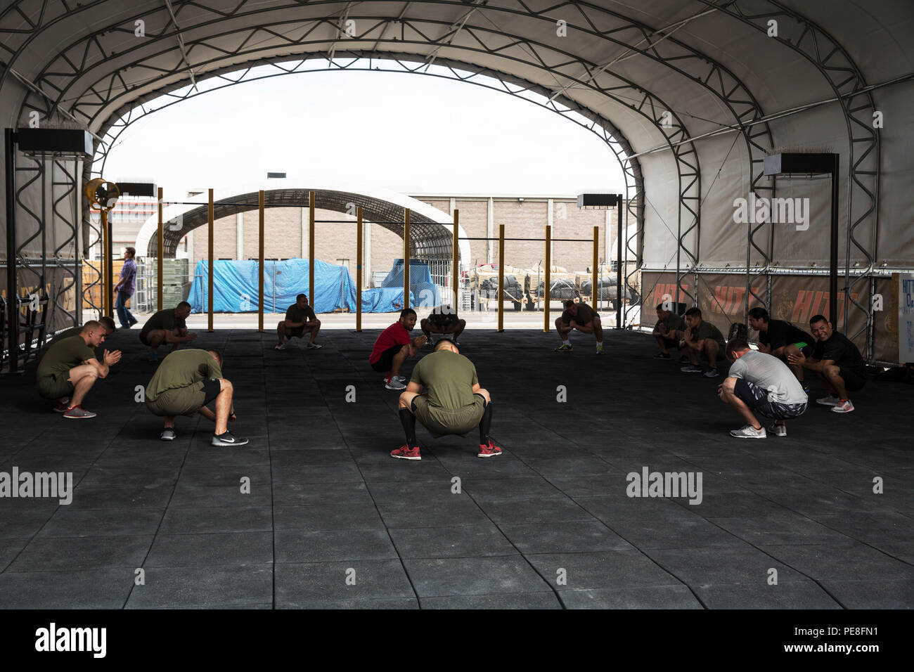 Marines run through dynamic warm-ups during a High Intensity Tactical ...
