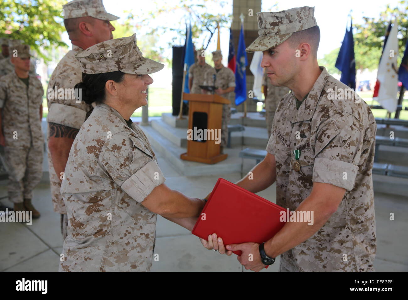 Captain Elliot Parks is congratulated by Col. Roberta L. Shea during ...