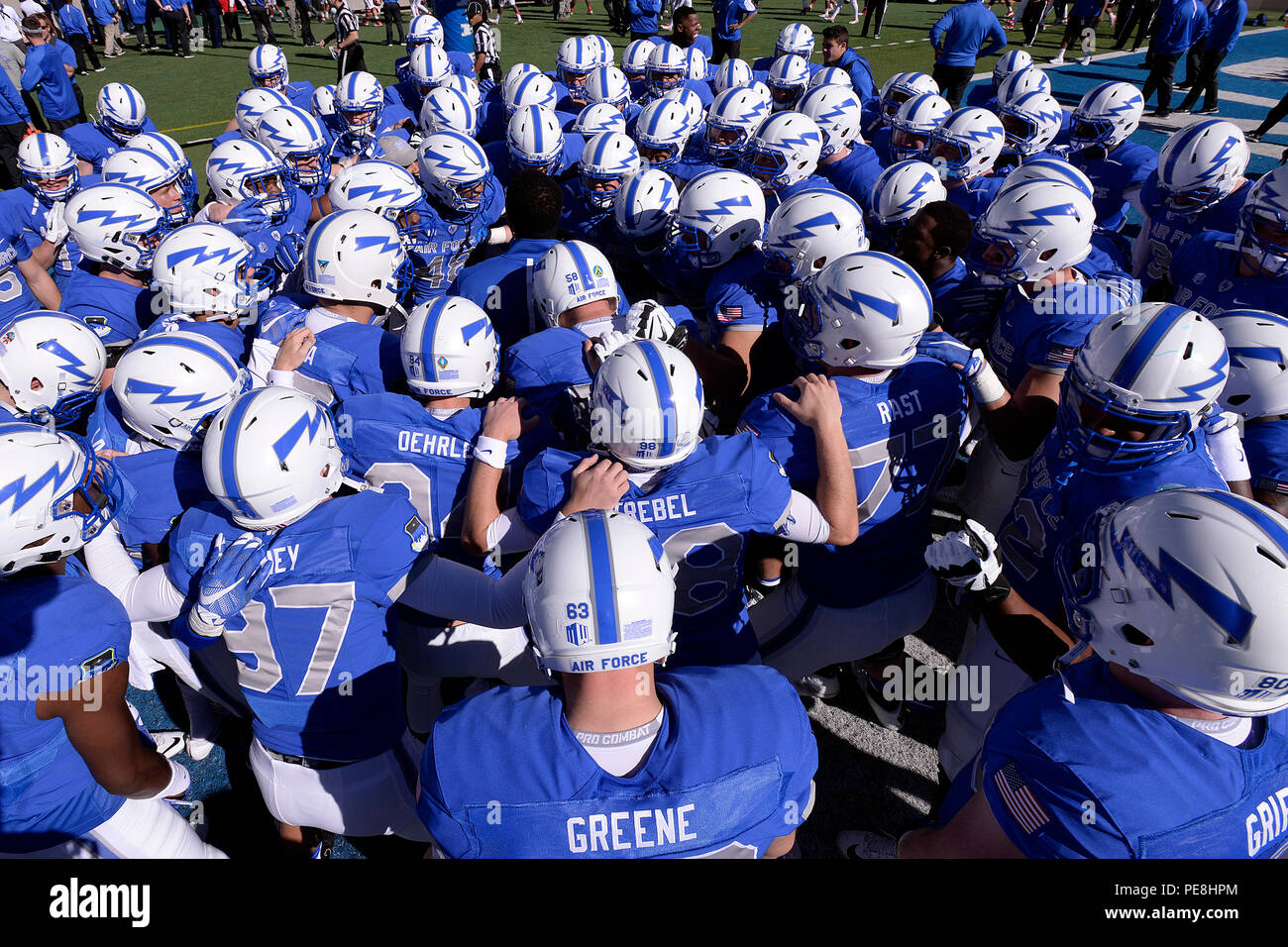 The U.S. Air Force Academy Falcons huddle before taking the field to ...