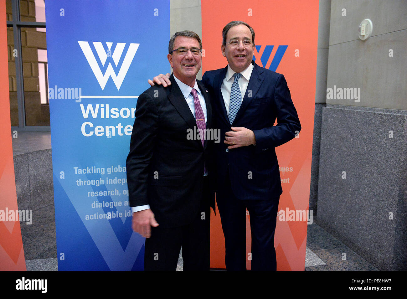 Secretary of Defense Ash Carter takes photos with guest before he ...
