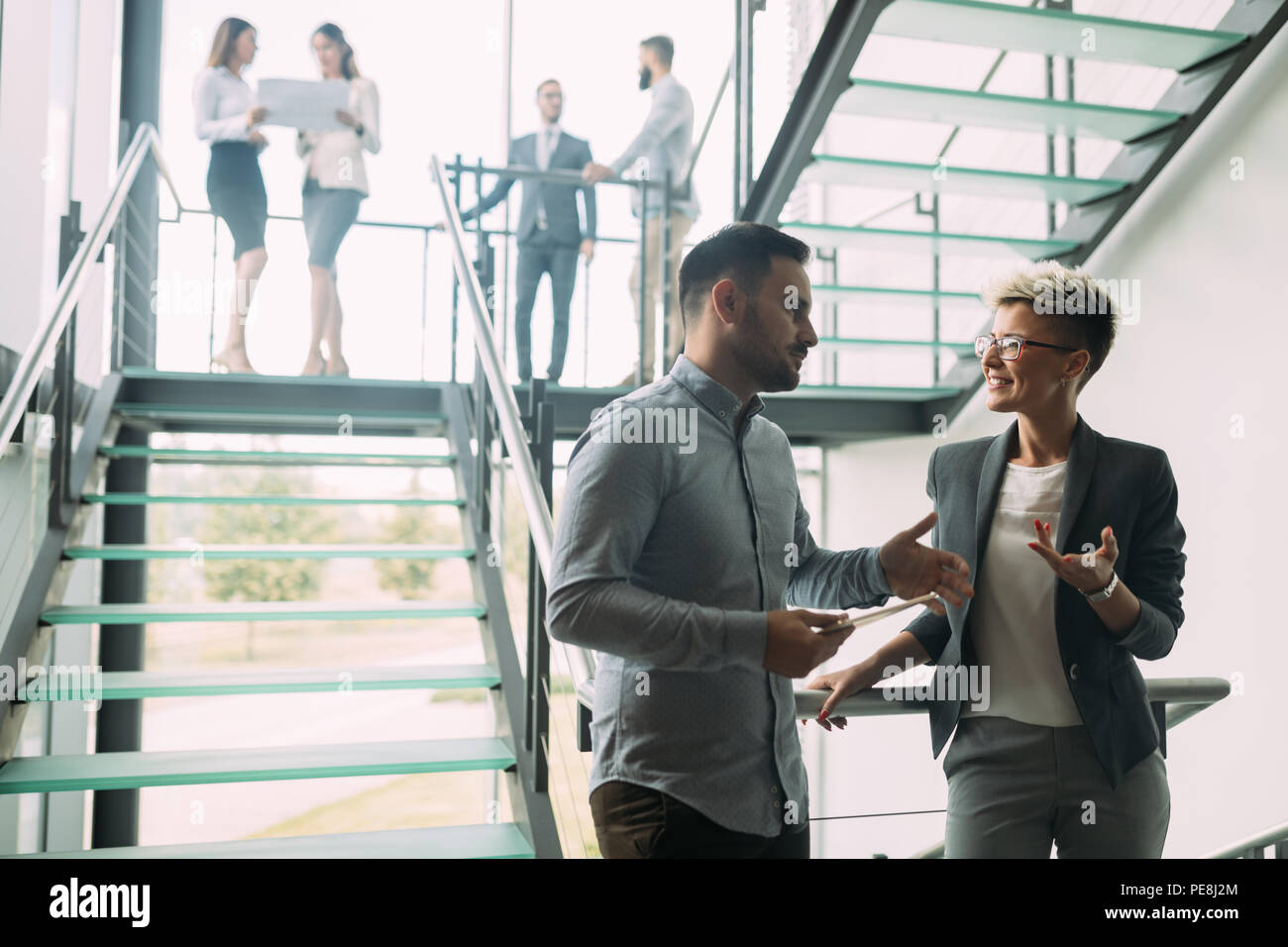 Adults talking together hi-res stock photography and images - Alamy