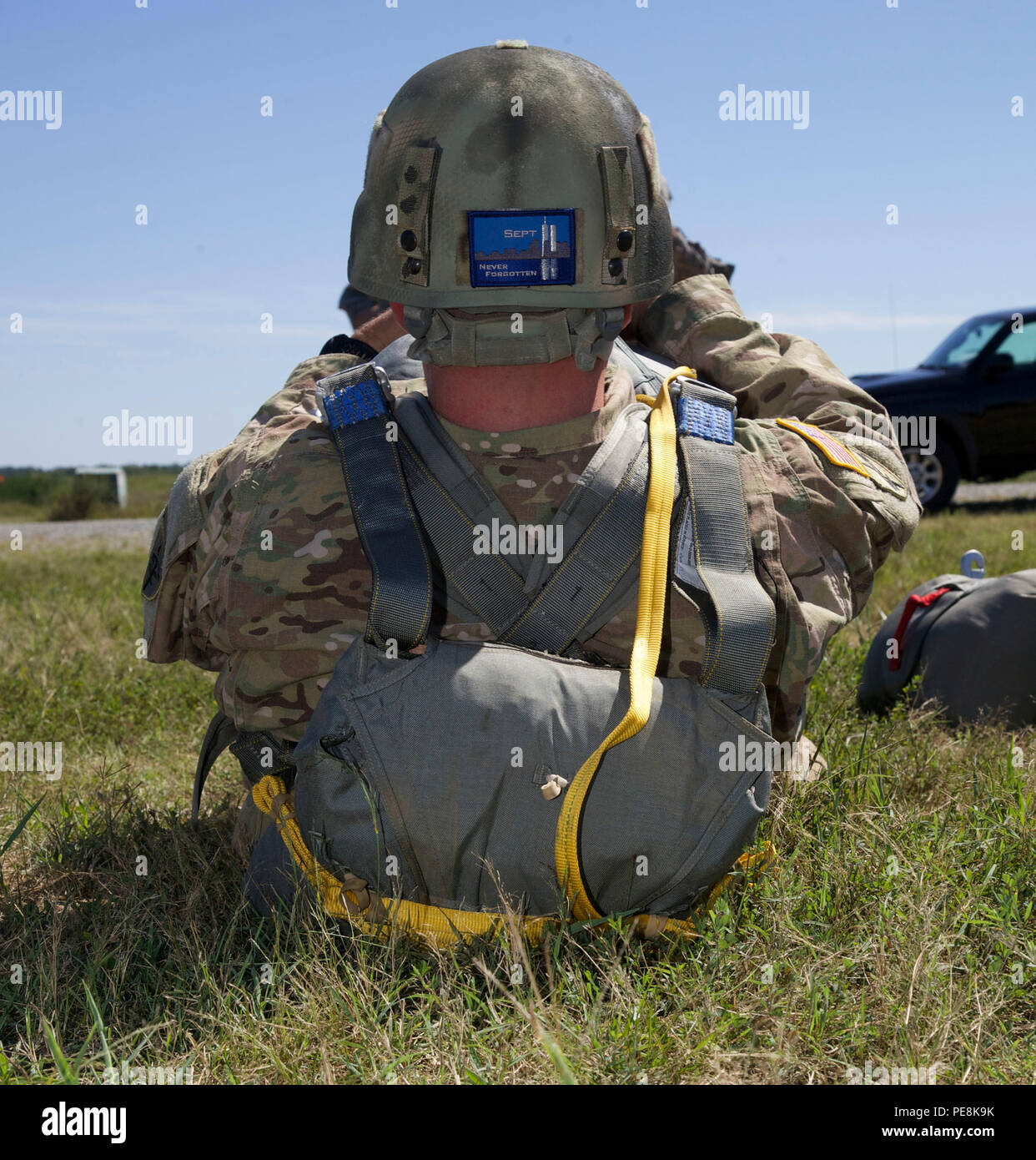 U.S. Army Paratrooper, Maj. Michael Okane, assigned to the 450th Civil ...