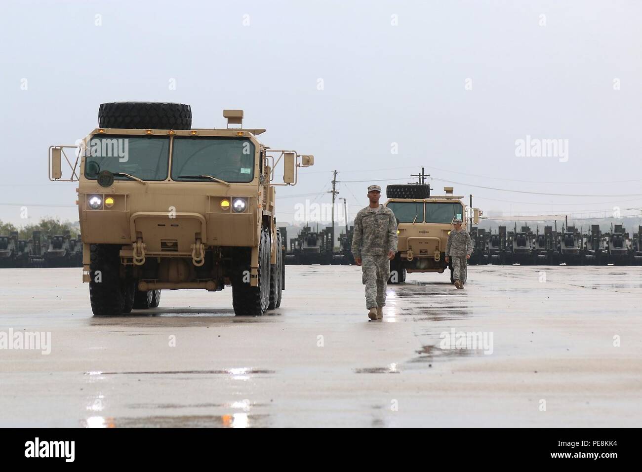 Sgt. Christopher Campbell (center), a Patriot launching station ...