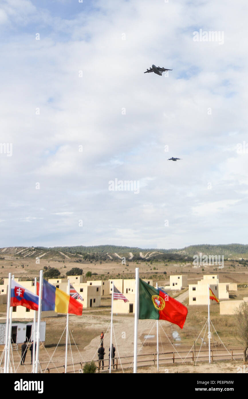 U.S. C-17 Globemaster III aircraft approach the drop zone for a joint ...