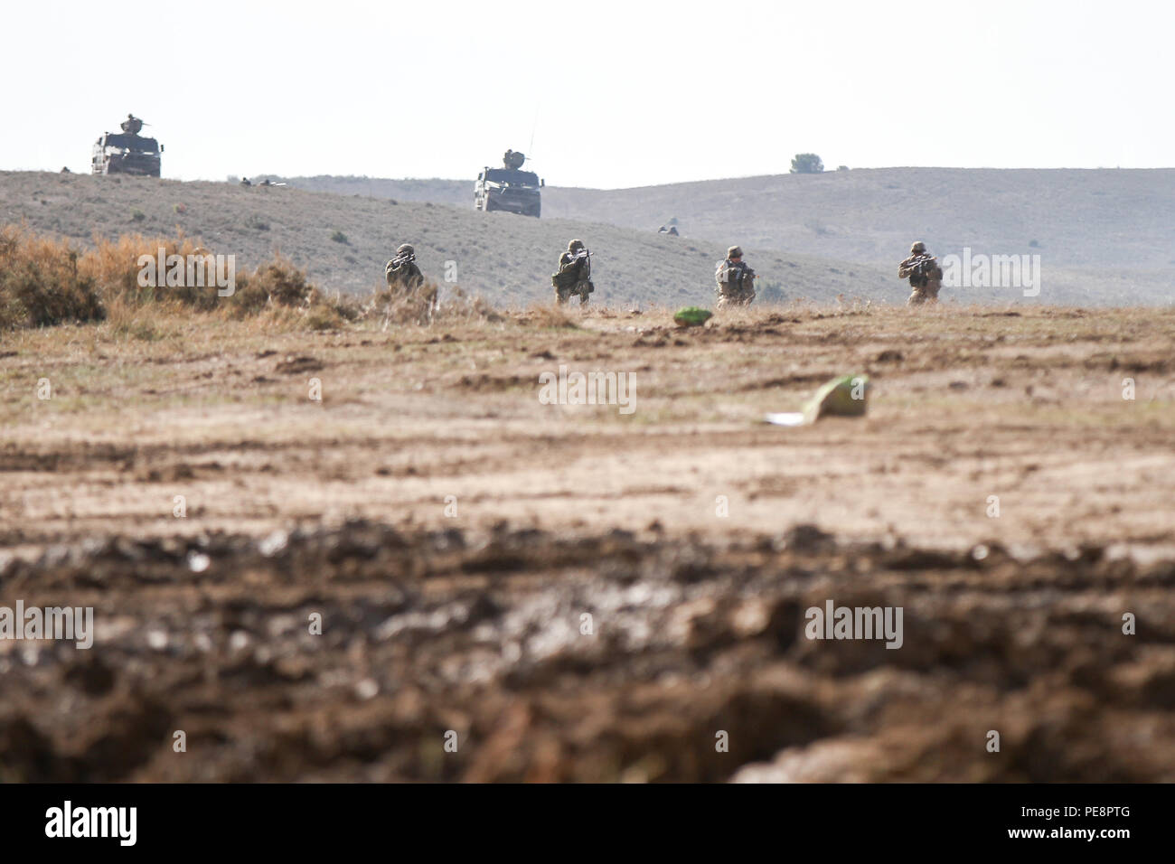 Soldiers and vehicles maneuver through the battle space of the Joint ...