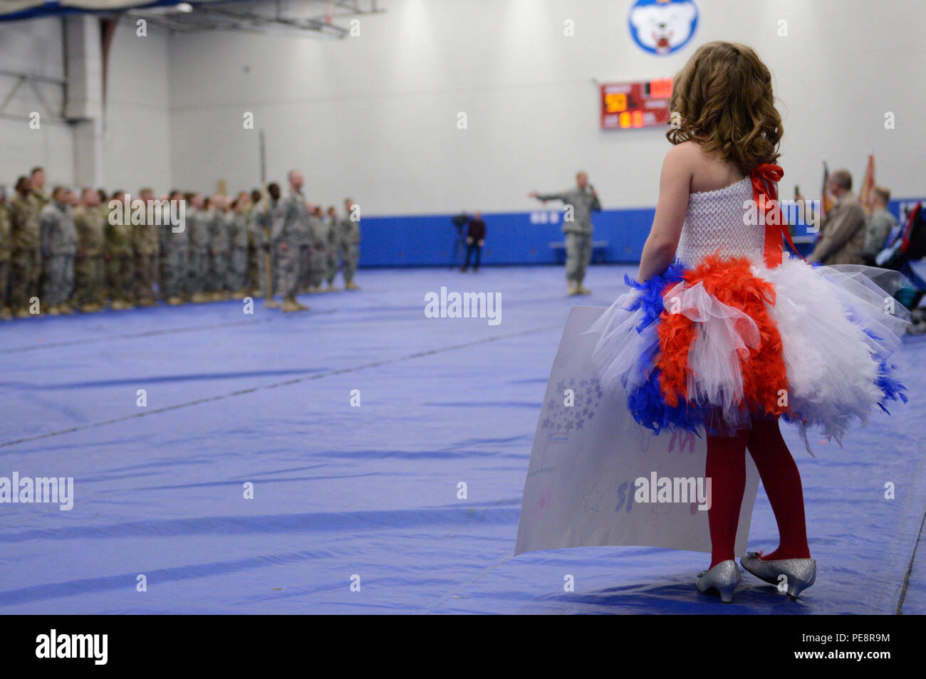 Ashlynn Deer, 7, waits for step-father Spc. William Goodwin, assigned ...
