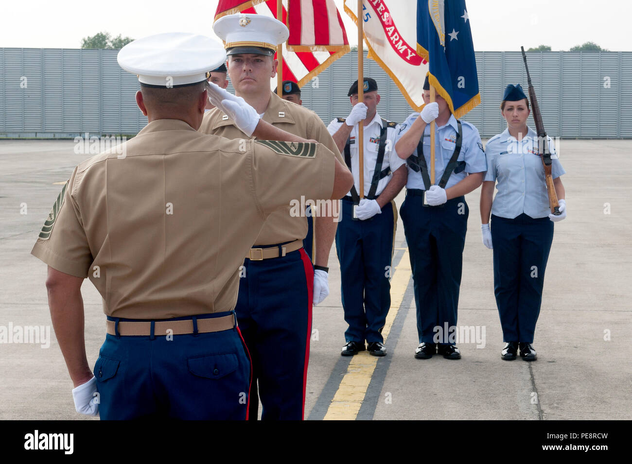 U.S. Marine Master Sgt. Jayson Franco renders a salute to U.S. Marine ...