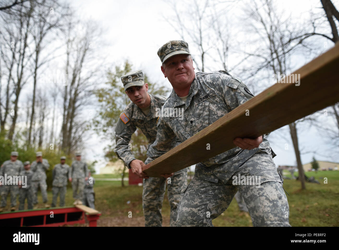 Spc. Brandon Coover, of Davenport, Iowa, and Spc. Jeffrey Hilderman, of ...
