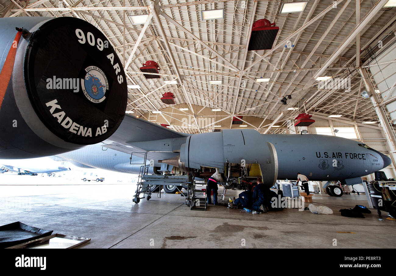 Members from the 909th Aircraft Maintenance Unit replace an F108 engine ...