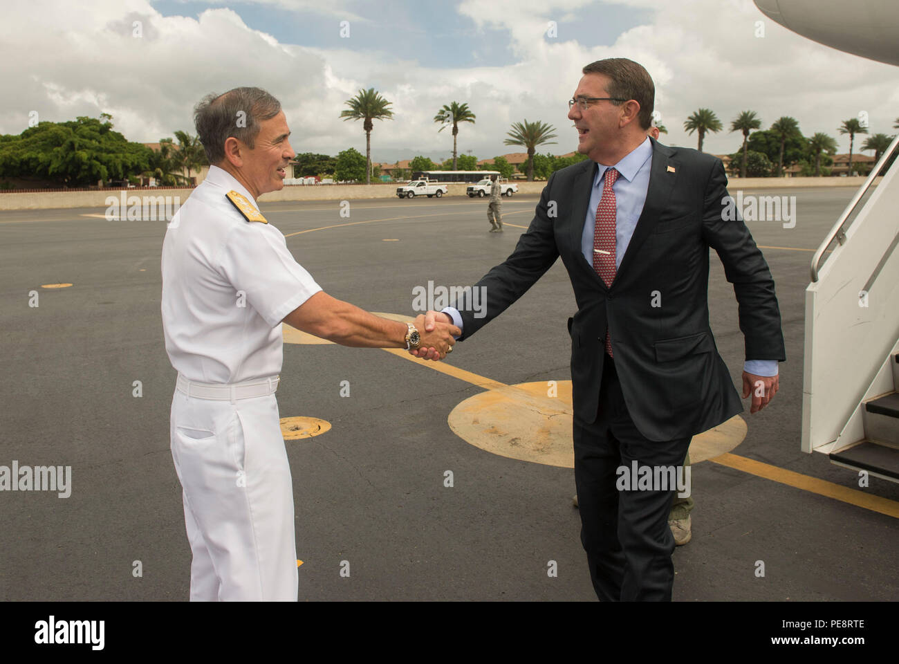 Secretary of Defense Ash Carter is greeted by Adm. Harry B. Harris, Jr ...