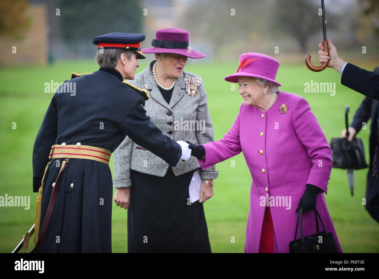 The Queen arrives and meets British Army Lt. Gen. Tim Evans, the ...
