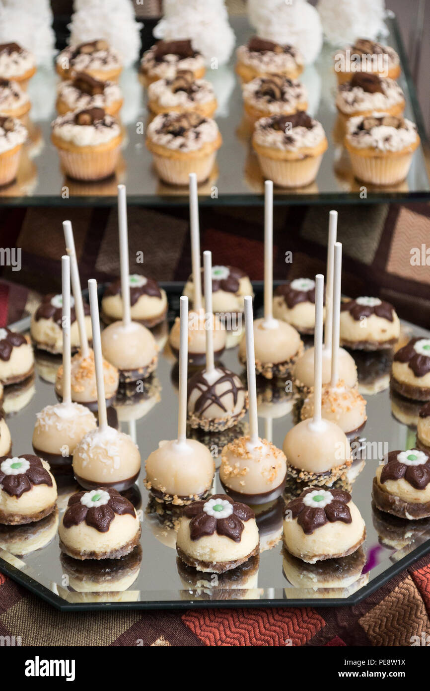 Dessert table with chocolate, nugget and mini cupcakes bites Stock ...