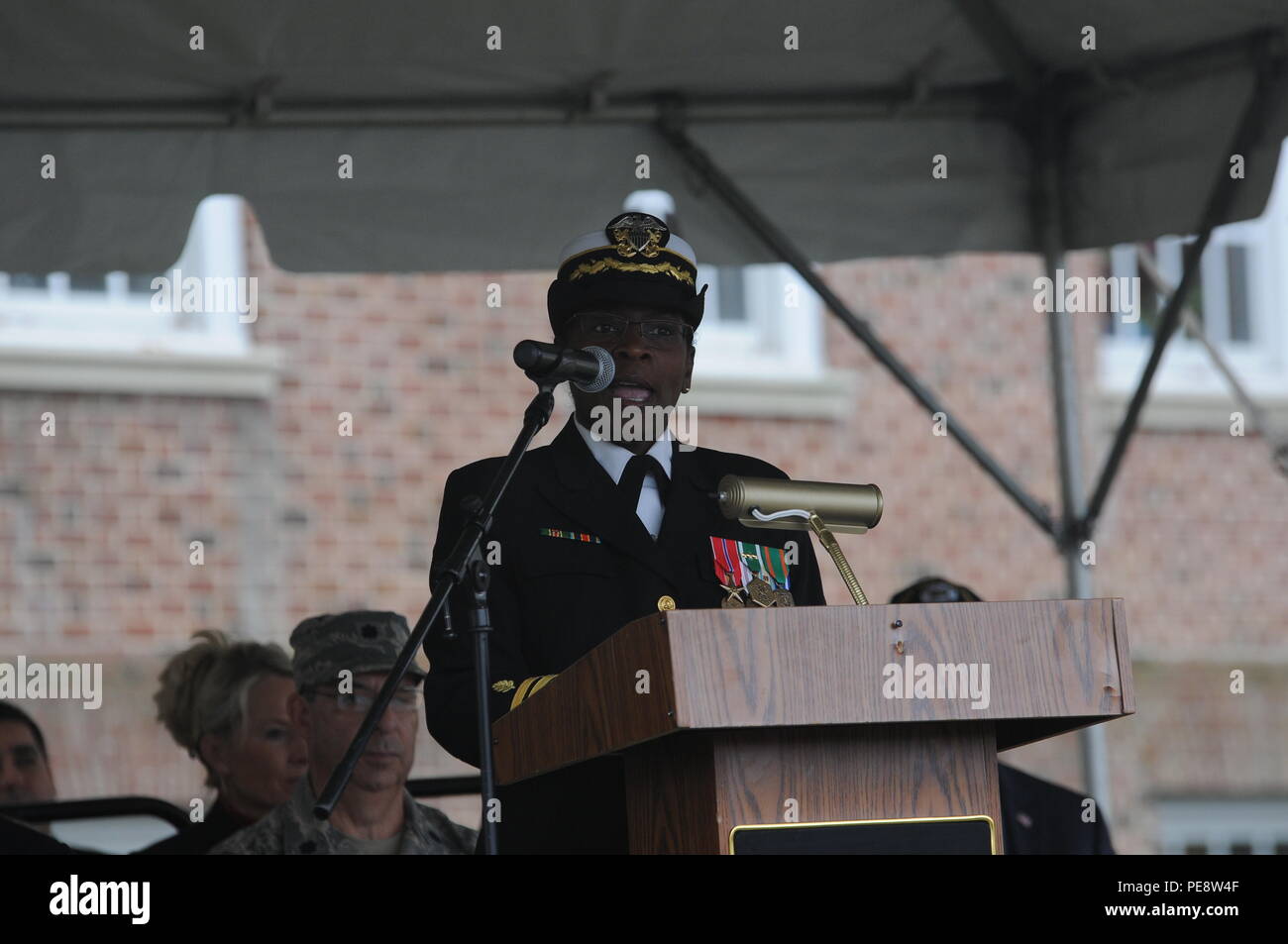 U. S. Navy Capt. Robin Gibbs delivers the keynote address during the ...