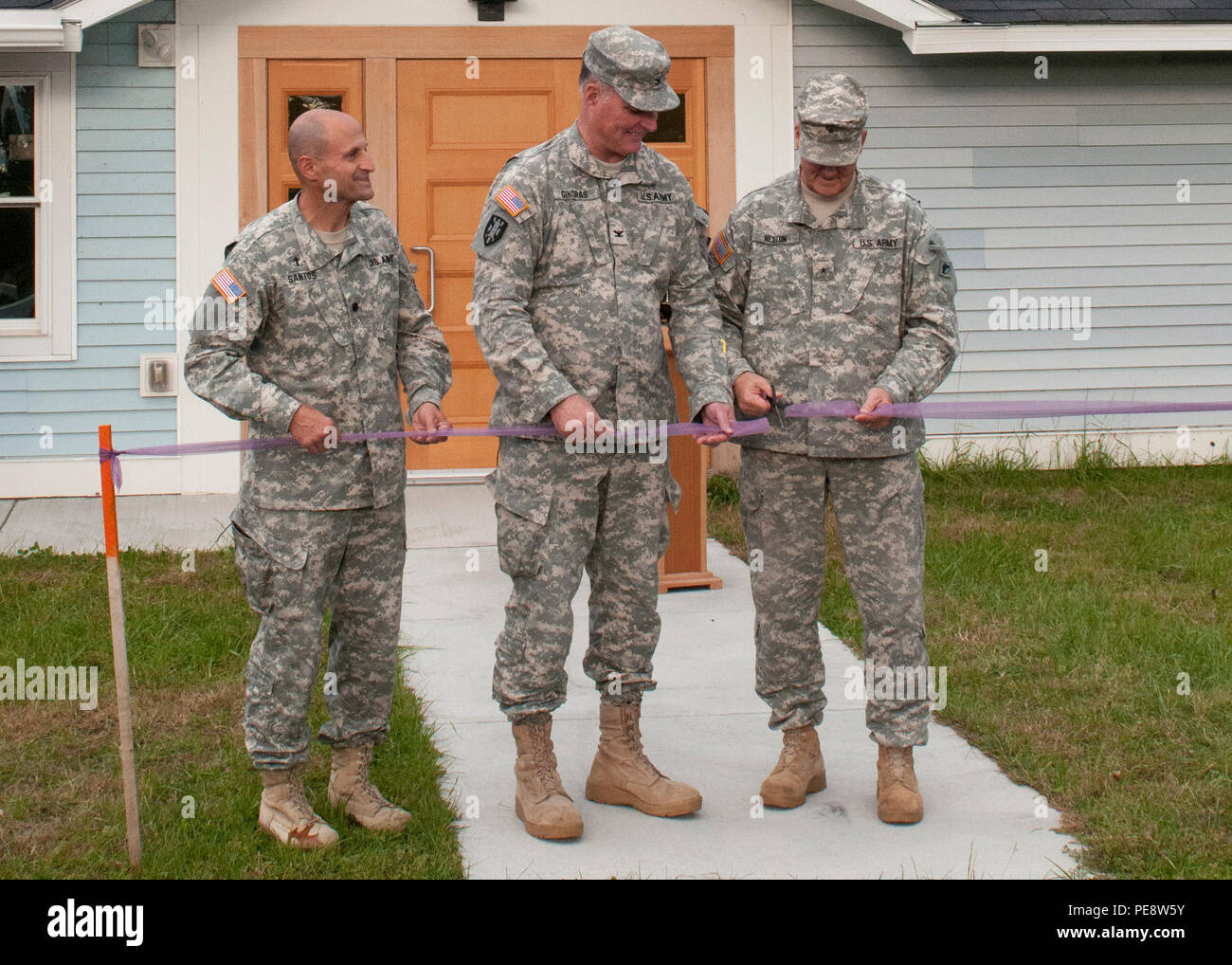 U.S. Army Lt. Col. Wayne Santos (left), Col. Robert Gingras (center ...