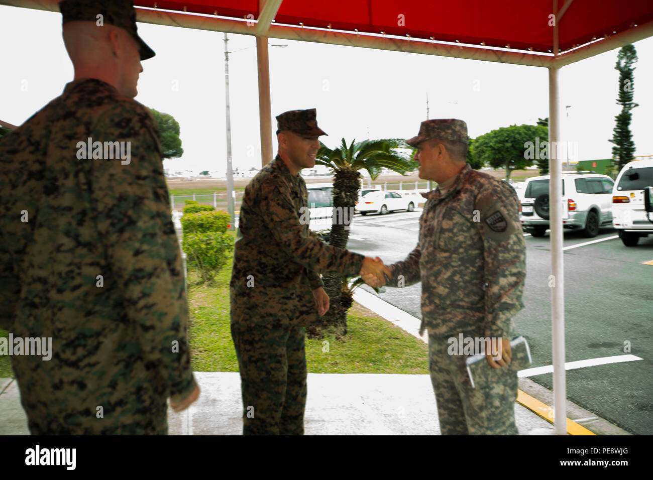 U.S. Army Maj. Gen. Kenneth Roberts, right, shakes hands with U.S ...