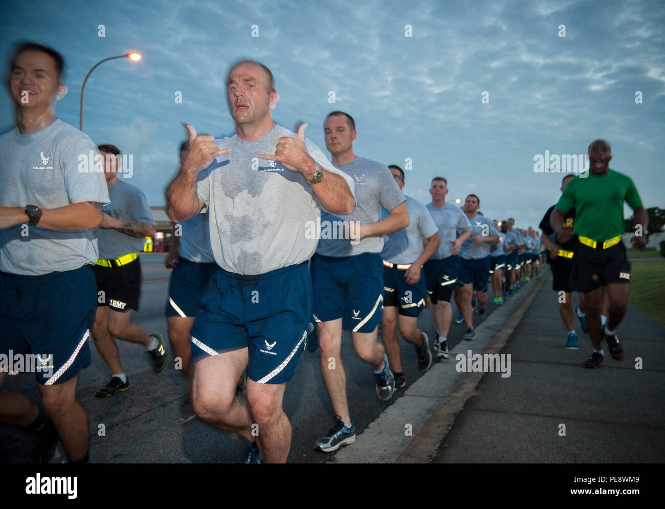 Airmen and Soldiers run together during an Army/Air Force 5K run Nov. 6 ...