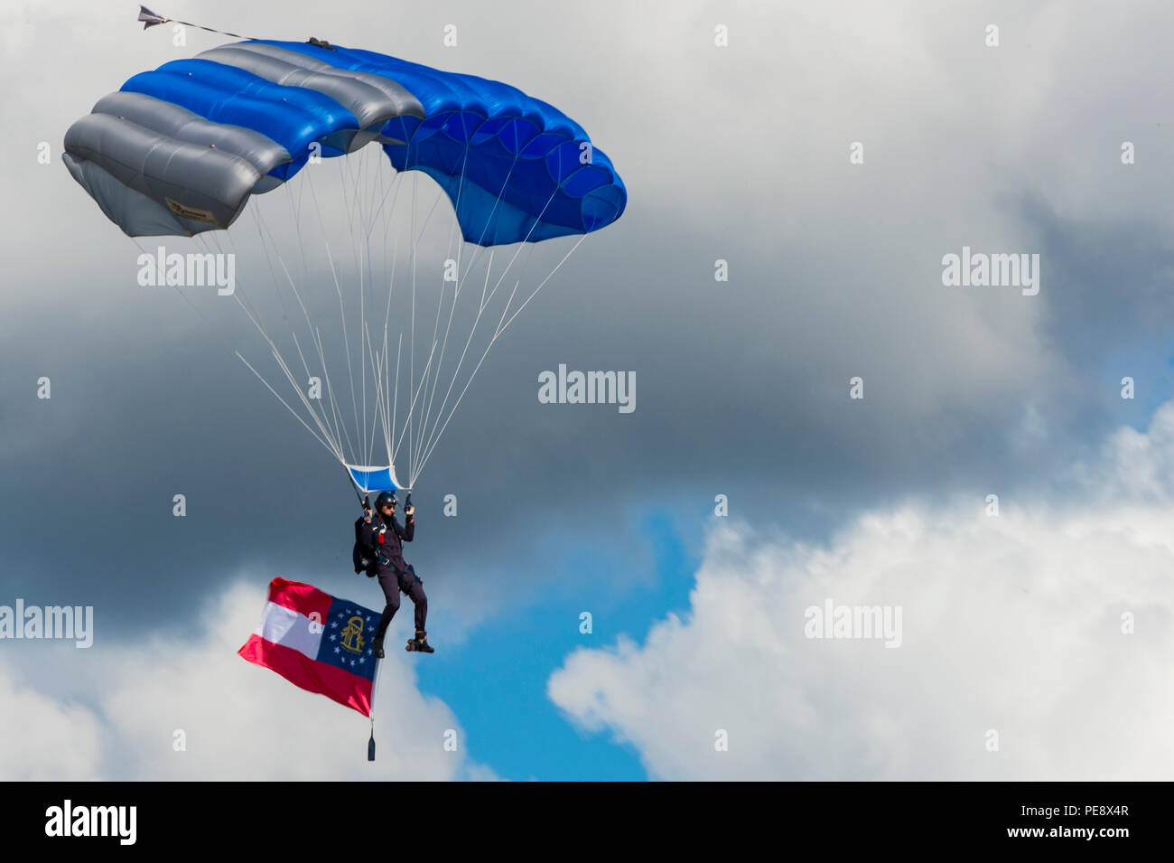 A member of the U.S. Air Force Academy Wings of Blue parachute team ...