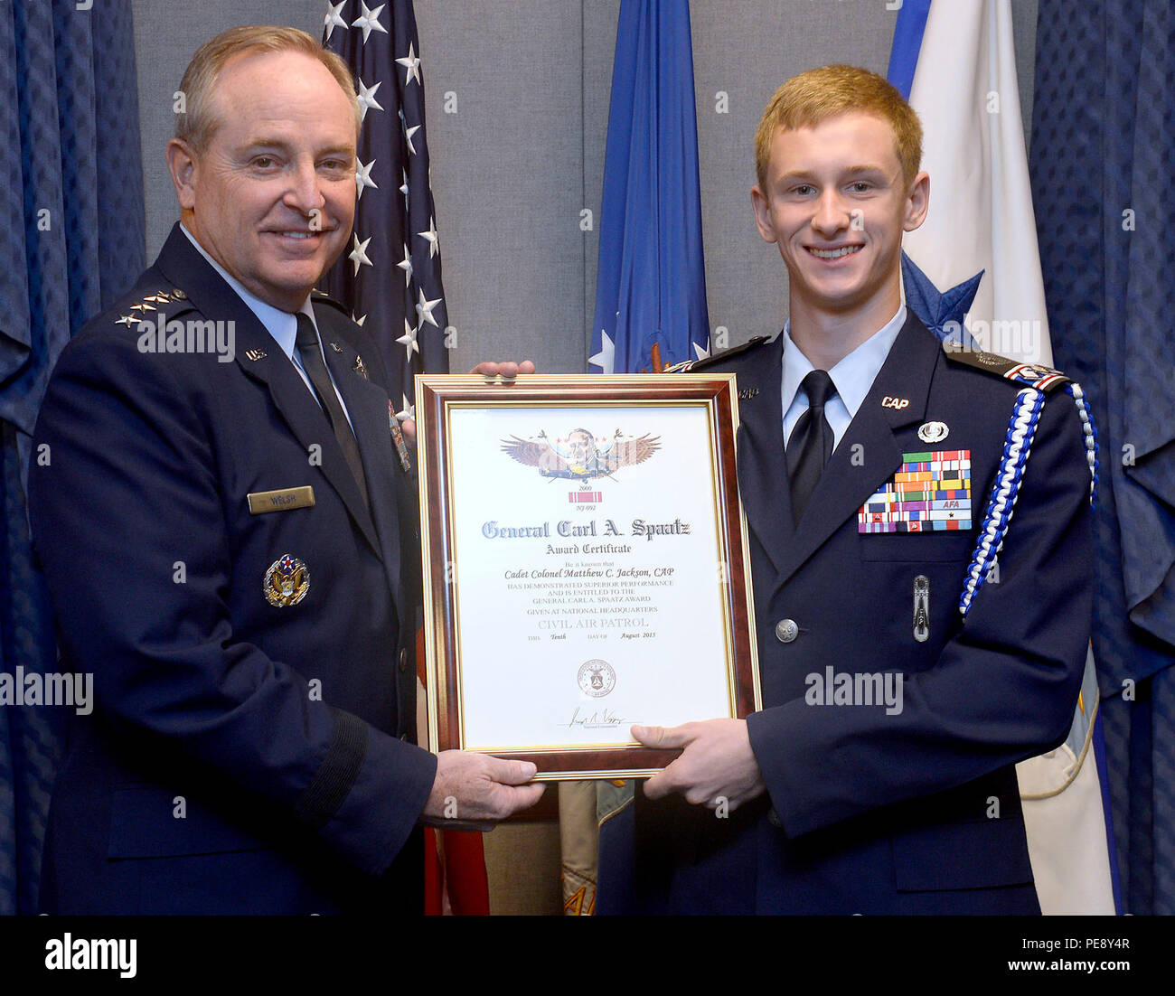 Air Force Chief of Staff Gen. Mark A. Welsh III presents Civil Air Patrol Cadet Matthew C ...