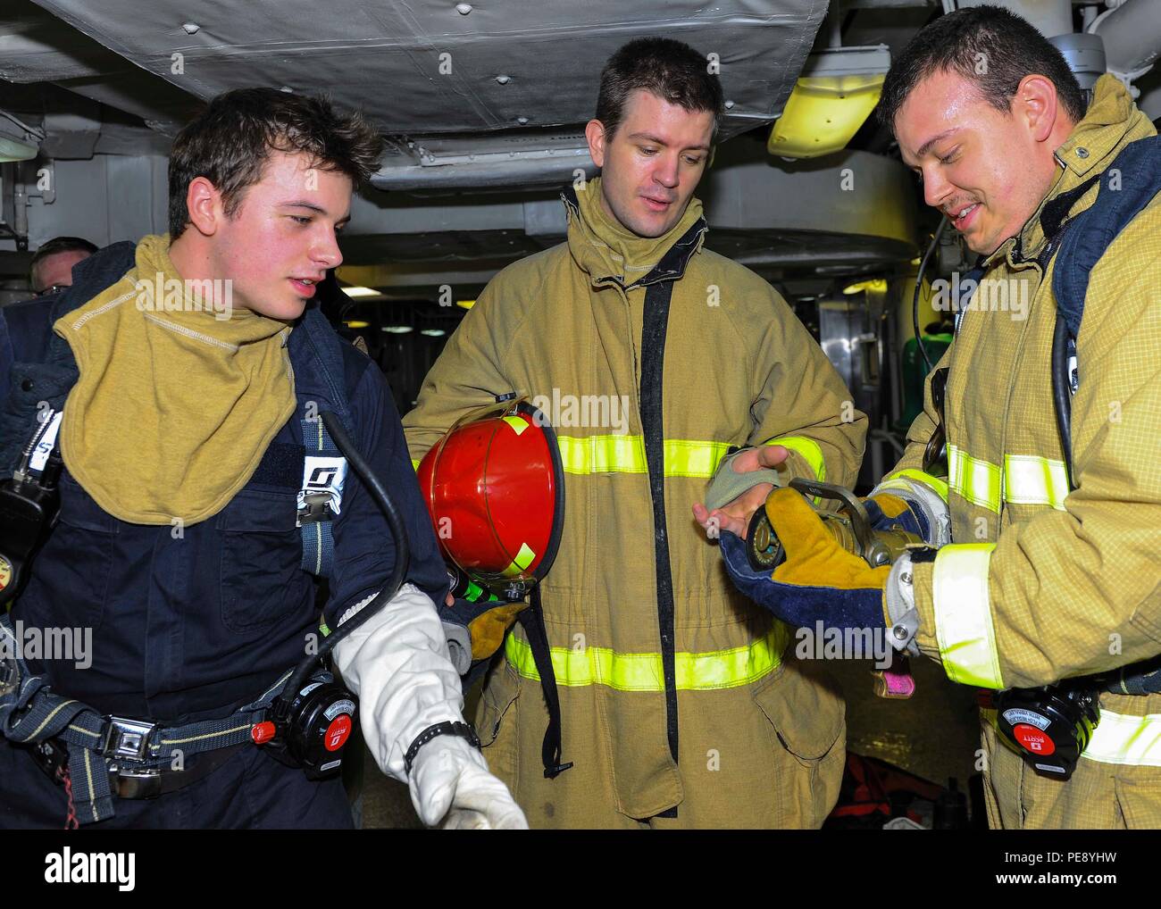 151107-N-CQ428-060 PACIFIC OCEAN (Nov. 7, 2015) – Sailors dons fire ...