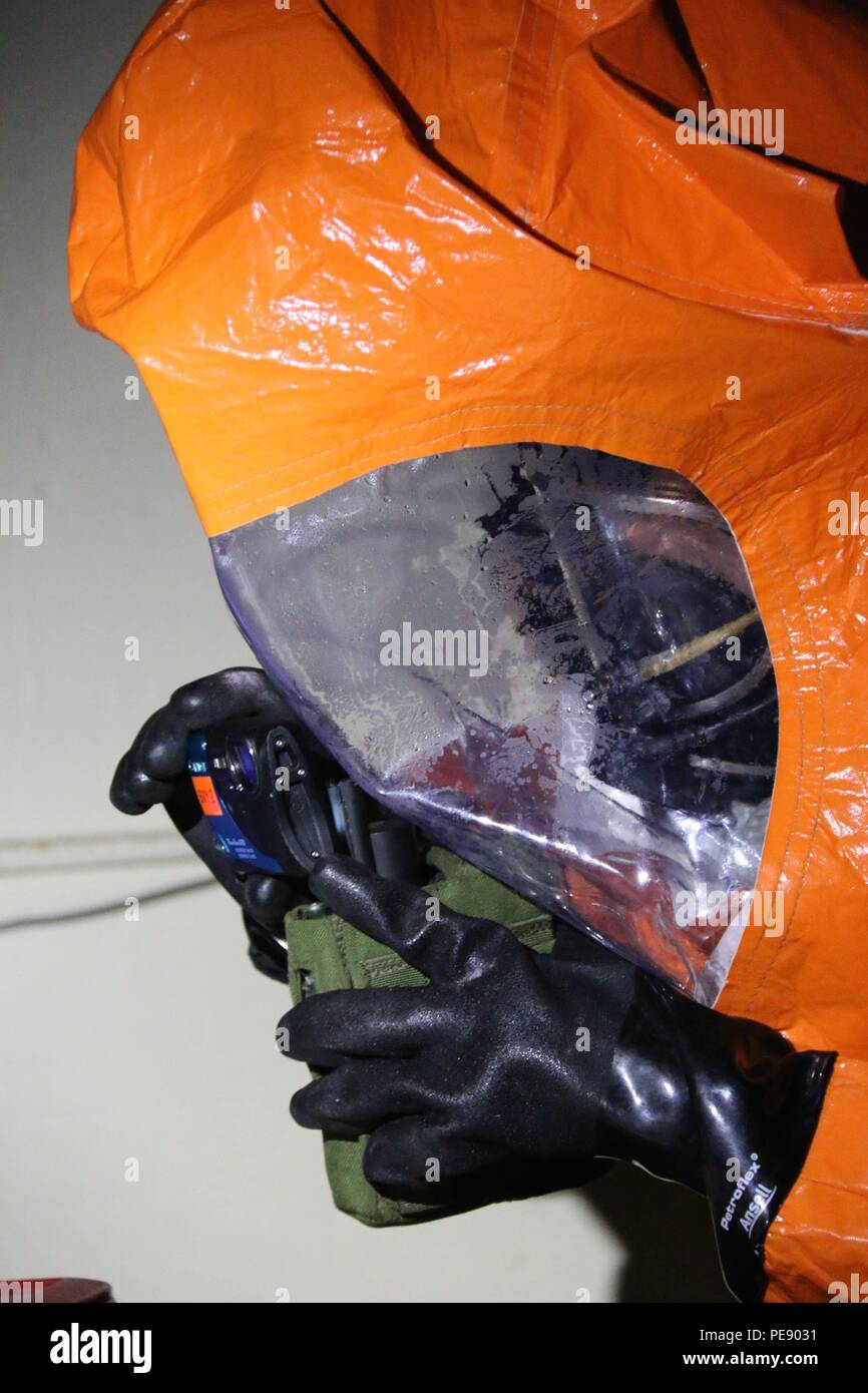 Staff Sgt. Jason Haggard documents his findings from chemical tests ...