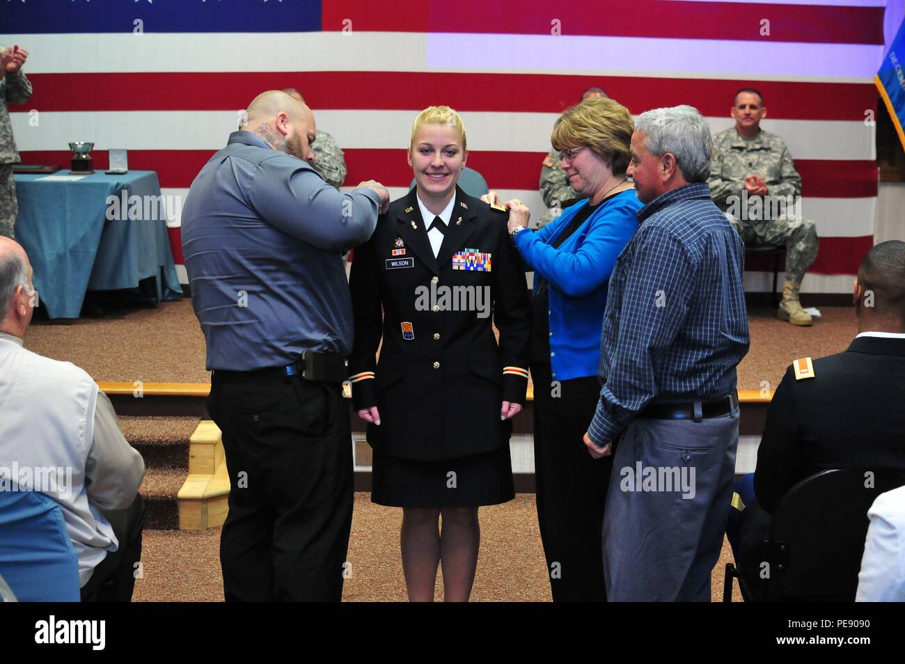 Amanda Wilson is pinned 2nd Lt. by her husband and parents at the ...