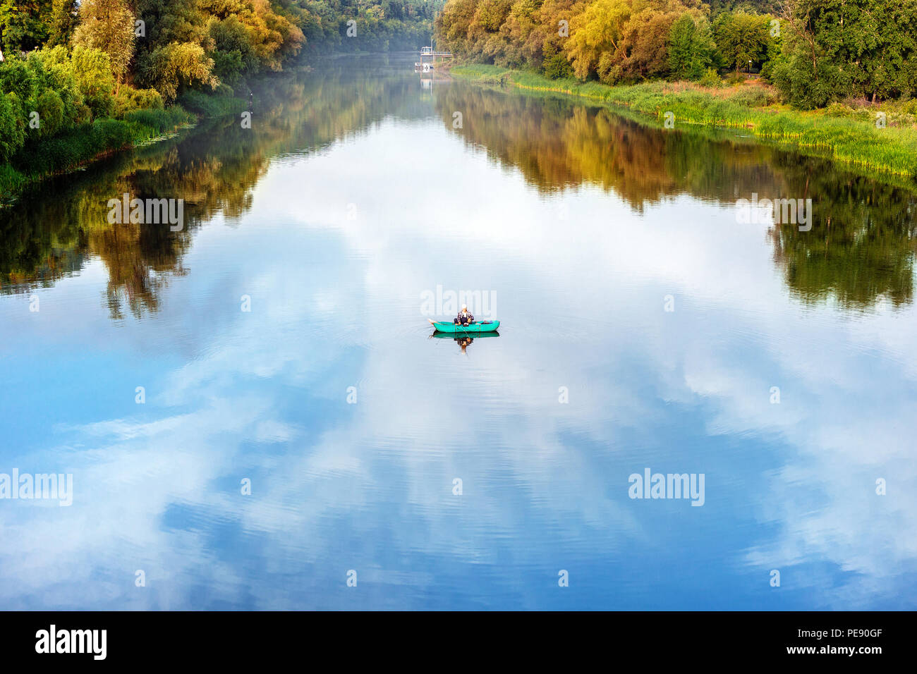 Bright scenic landscape of river in bright multicolored autumn forest ...