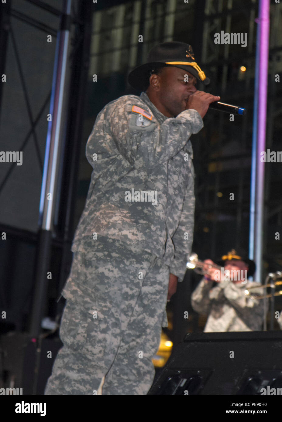 Sgt. Randy Holmes, a vocalist with the 1st Cavalry Division Band, sings ...
