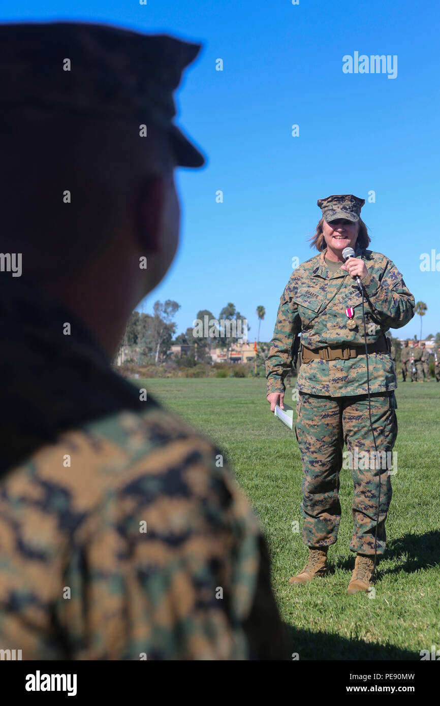 Master Gunnery Sgt. Diane Sharpe addresses her son while speaking ...