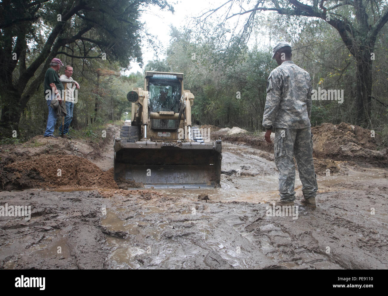 U.S. Army engineers with the South Carolina National Guard repair roads ...