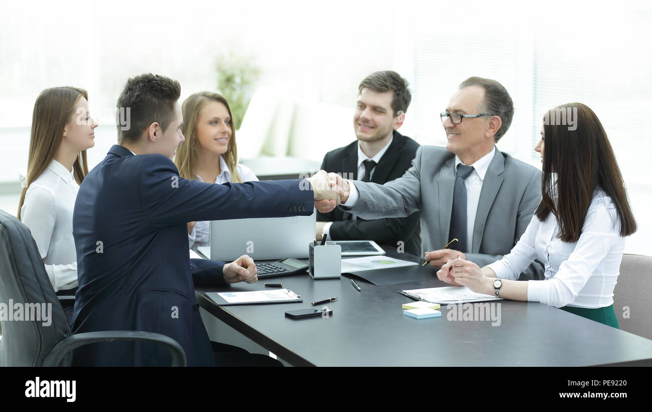 business partners shaking hands after a successful transaction Stock ...