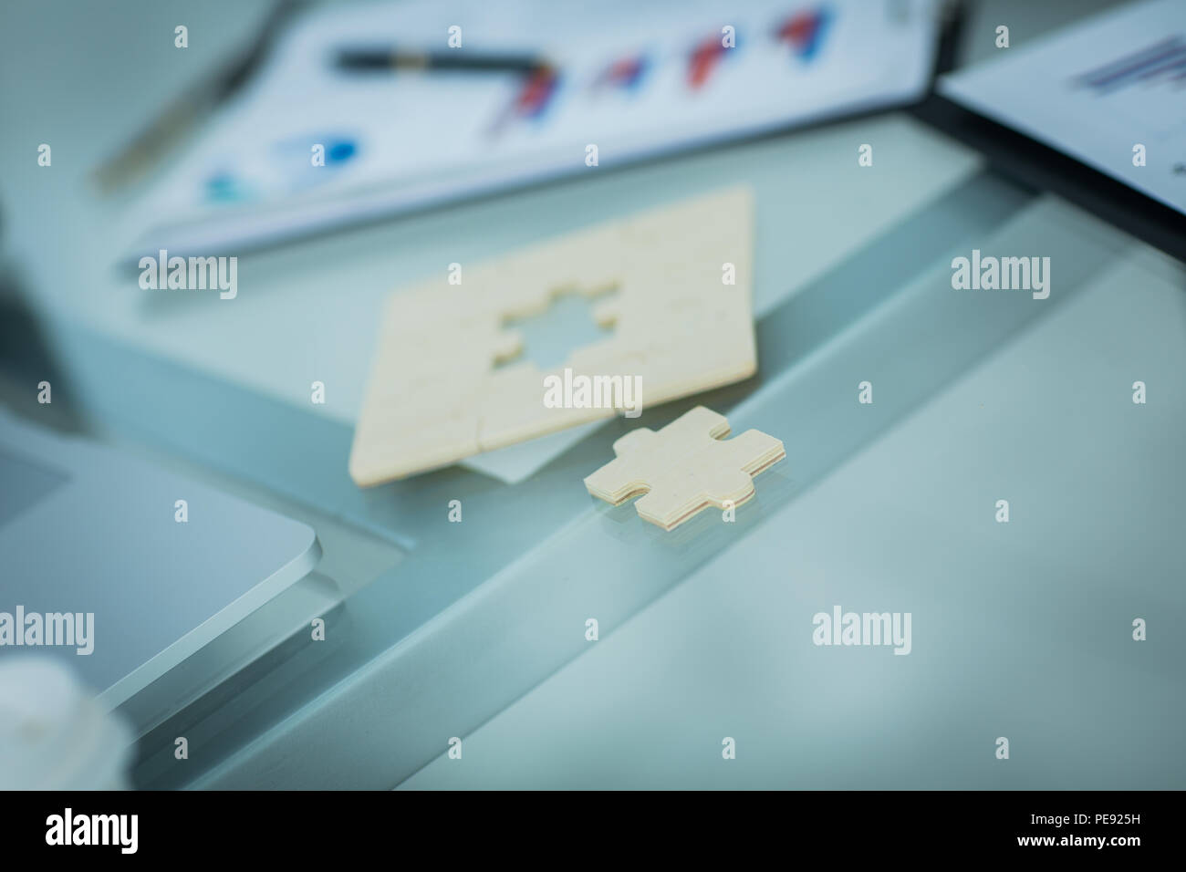 closeup.the puzzle on the Desk of a businessman Stock Photo - Alamy