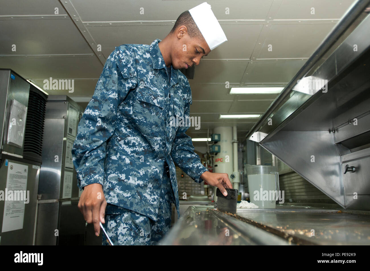 SASEBO, Japan (Nov. 12, 2015) – Culinary Specialist Seaman Recruit ...