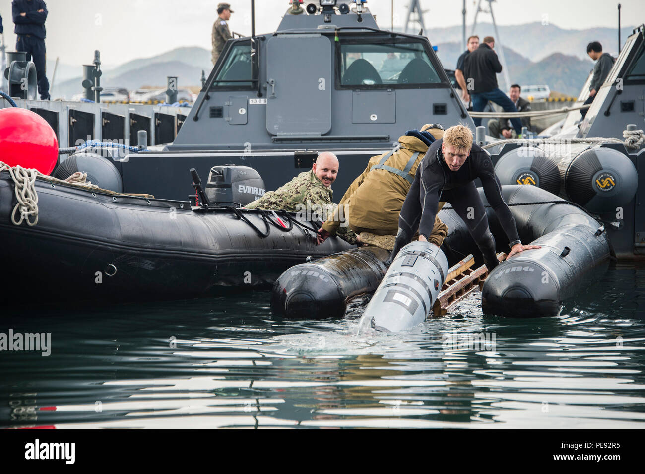 U.S. Sailors, assigned to Explosive Ordnance Disposal Mobile Unit ...