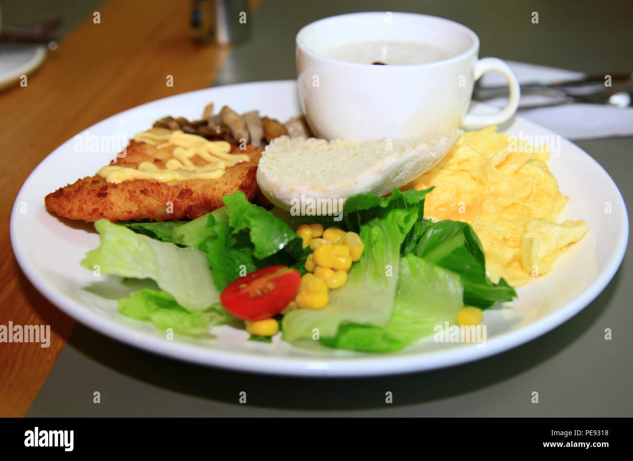 Plate with a breakfast. Side view Stock Photo - Alamy