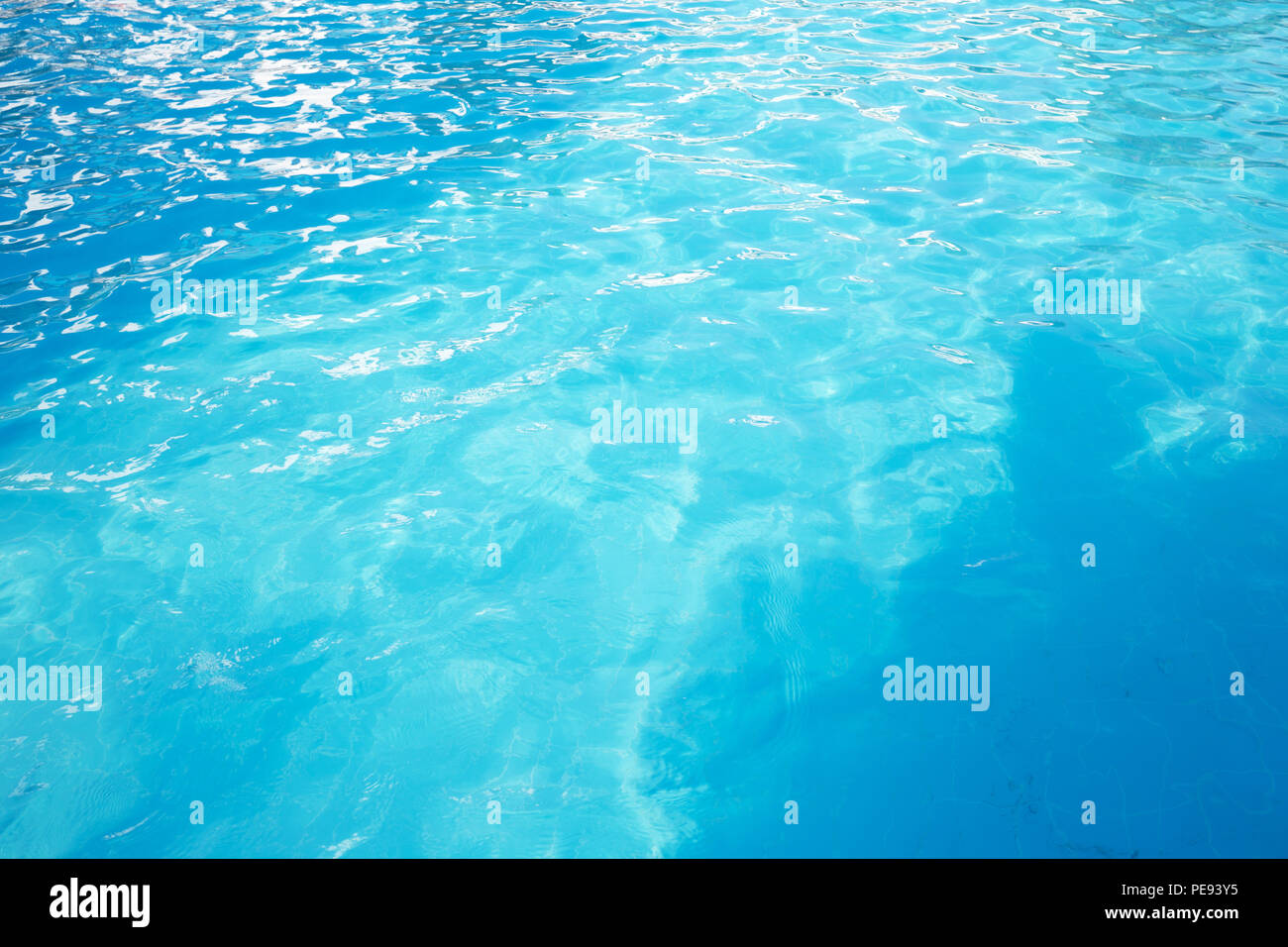 Blue swimming pool water with sun reflection. Summer concept Stock ...