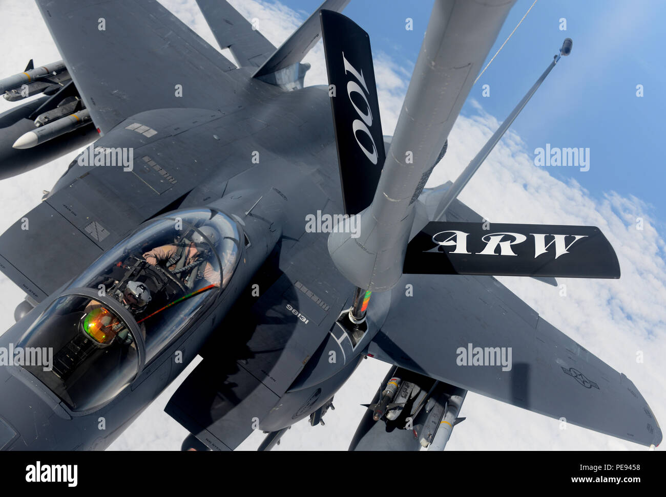 A KC-135 Stratotanker from the 100th Air Refueling Wing refuels an F ...