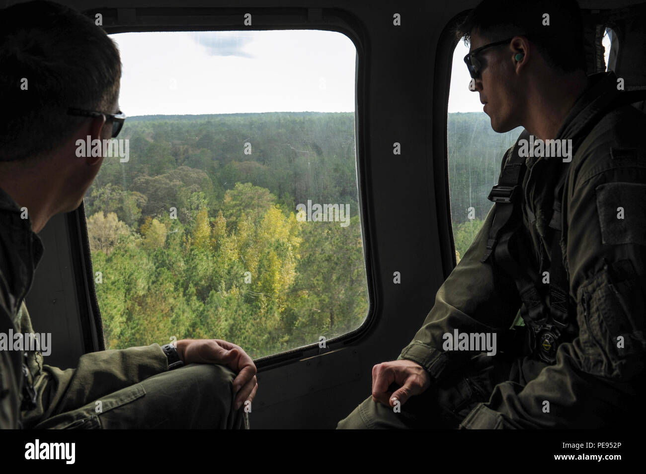 From left, U.S. Air Force Capt. Jeffrey Johnson and U.S. Air Force 1st ...