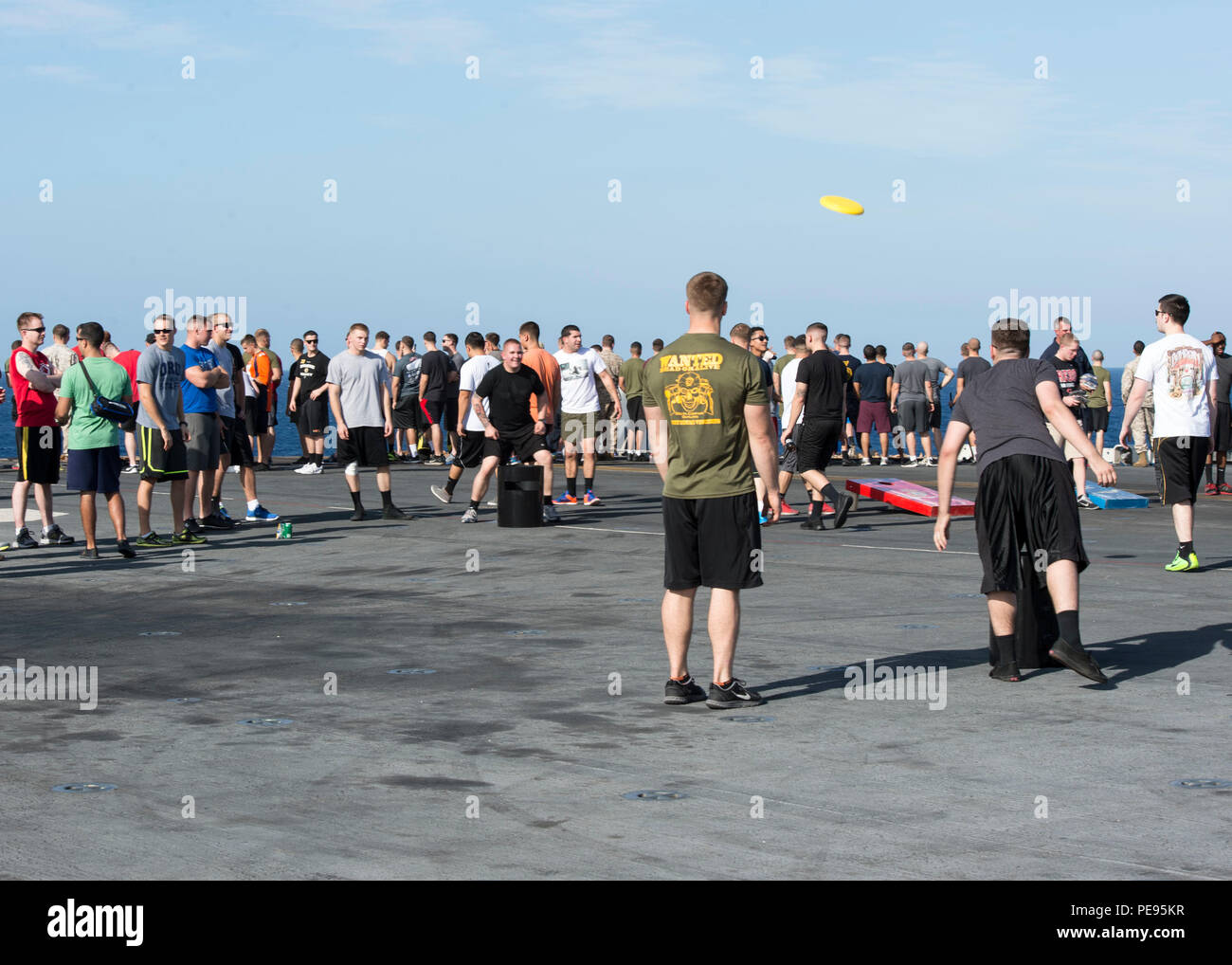 151108-N-AX638-100 RED SEA (Nov. 8, 2015) Sailors and Marines play ...