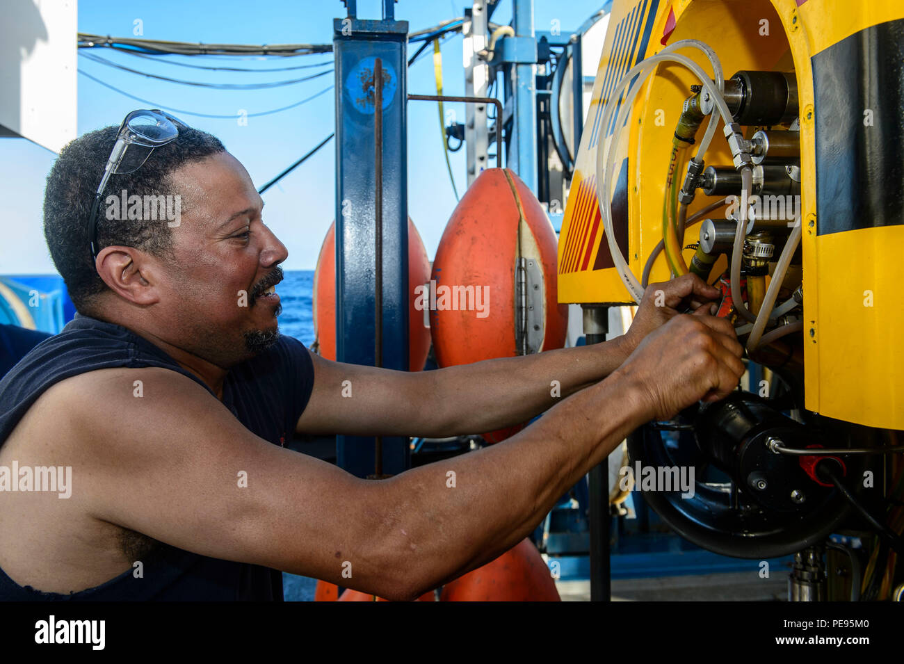 151110-N-RZ218-036 BAHAMAS (Nov. 10, 2015) Bruce Mayo, a contractor ...
