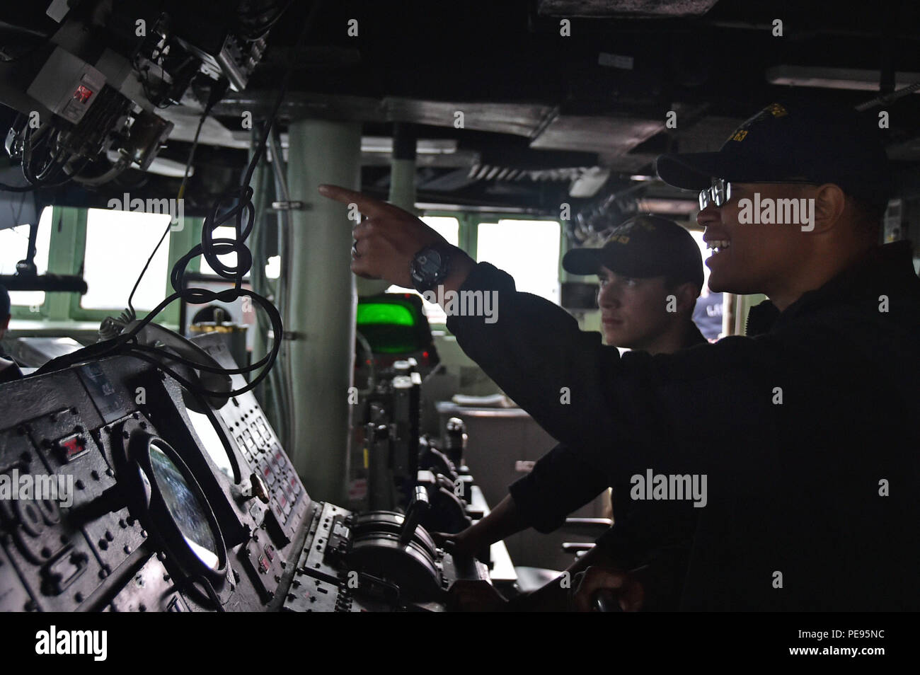 Helmsman aboard hi-res stock photography and images - Alamy