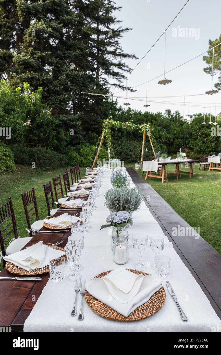 Laid tables for the gala dinner of the wedding Stock Photo - Alamy