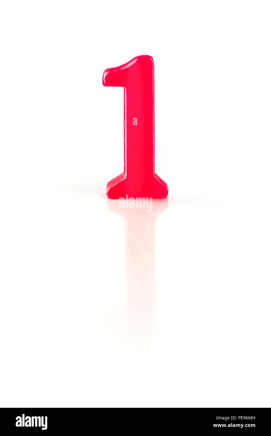 A photo of a red number one on a white background with copyspace Stock ...