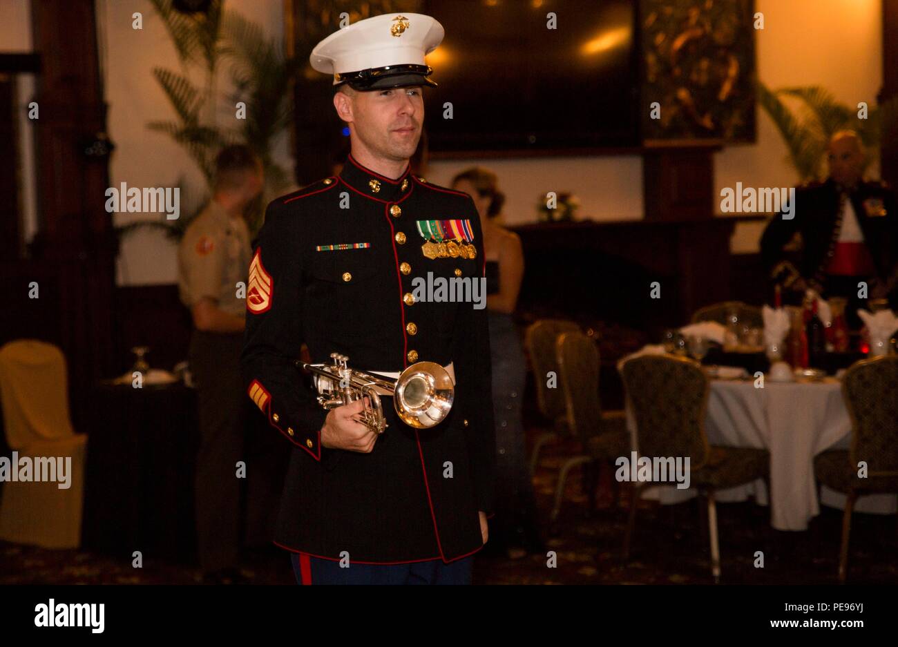 Staff Sgt. Justin Schmidt prepares to sound the five minute warning ...