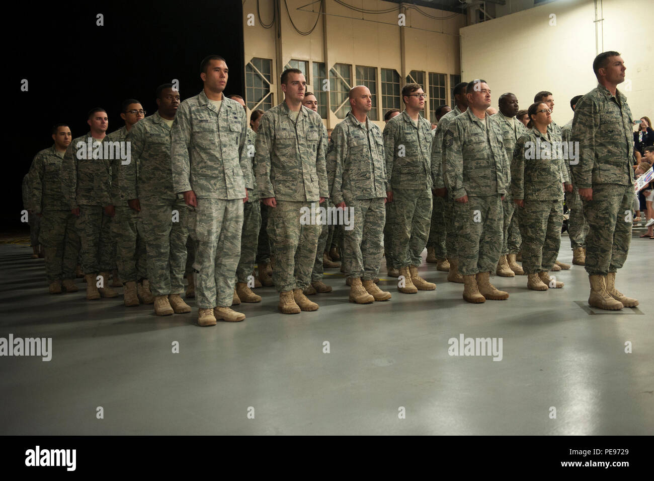 Airmen from the 823rd Base Defense Squadron march in formation during a re-deployment ceremony ...
