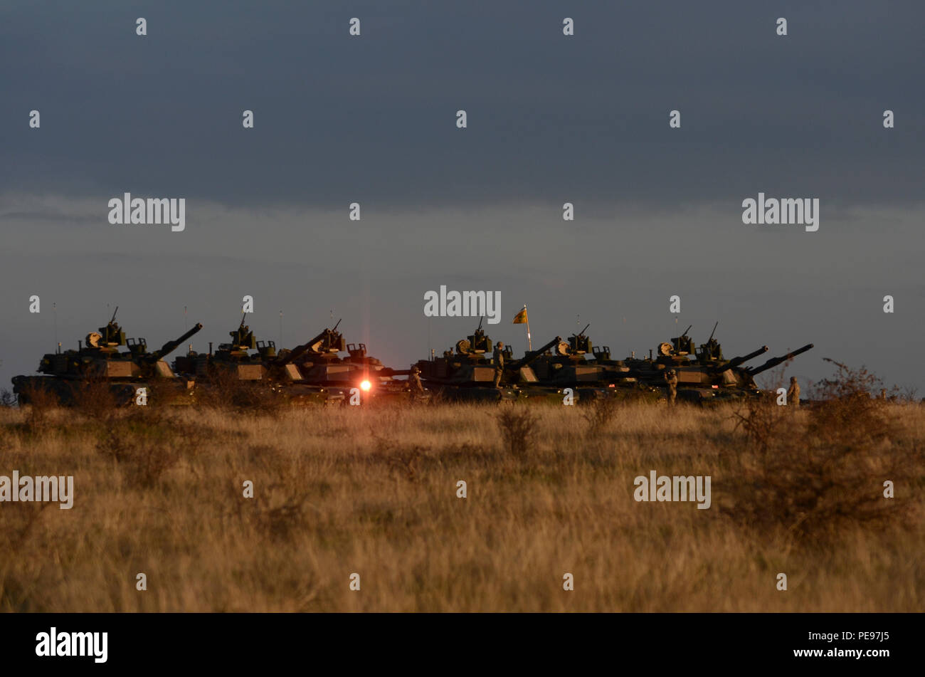 The sun reflects off an M1A2 System Enhancement Package Version 2 ...